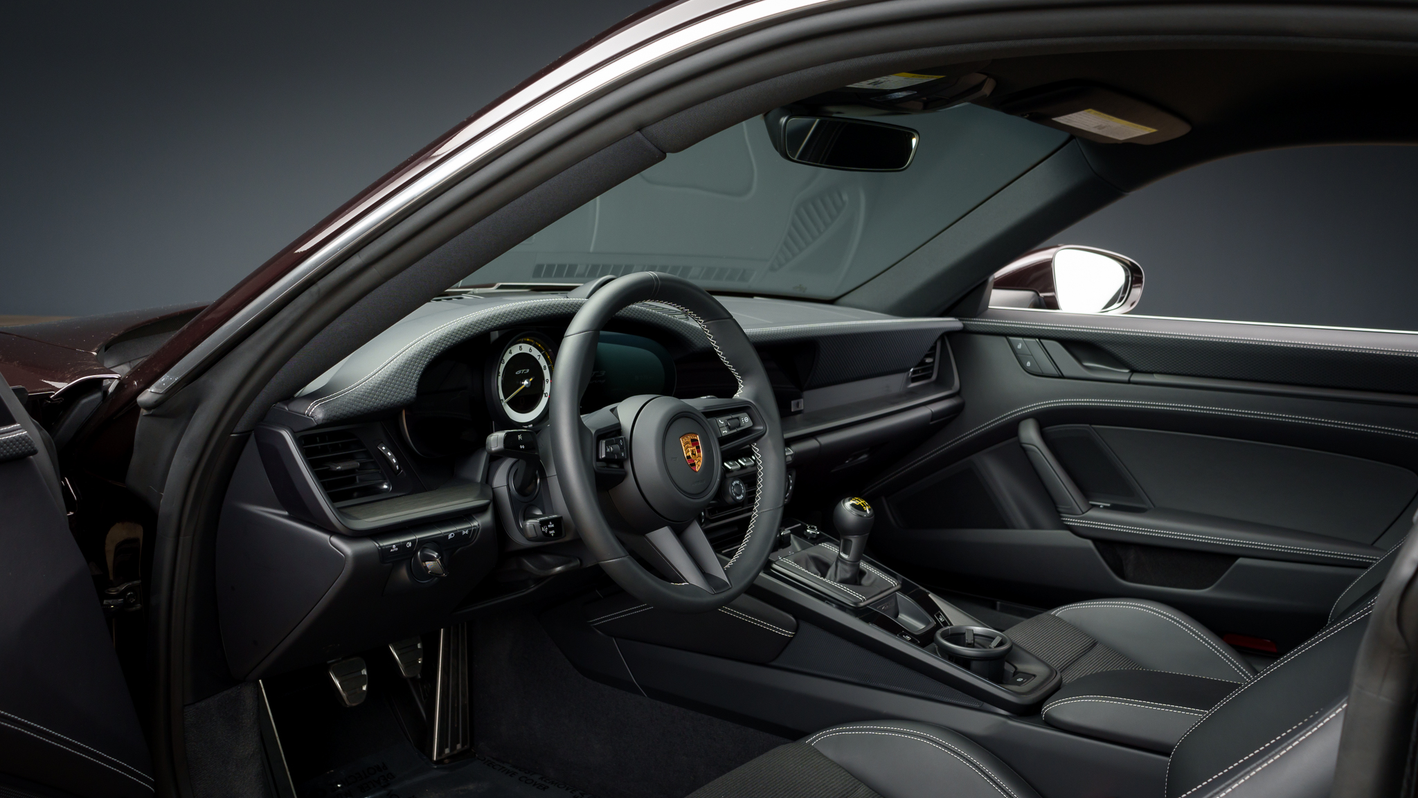 Wingless Wonder: A 2022 Porsche 911 GT3 Touring That's Priced Below Average